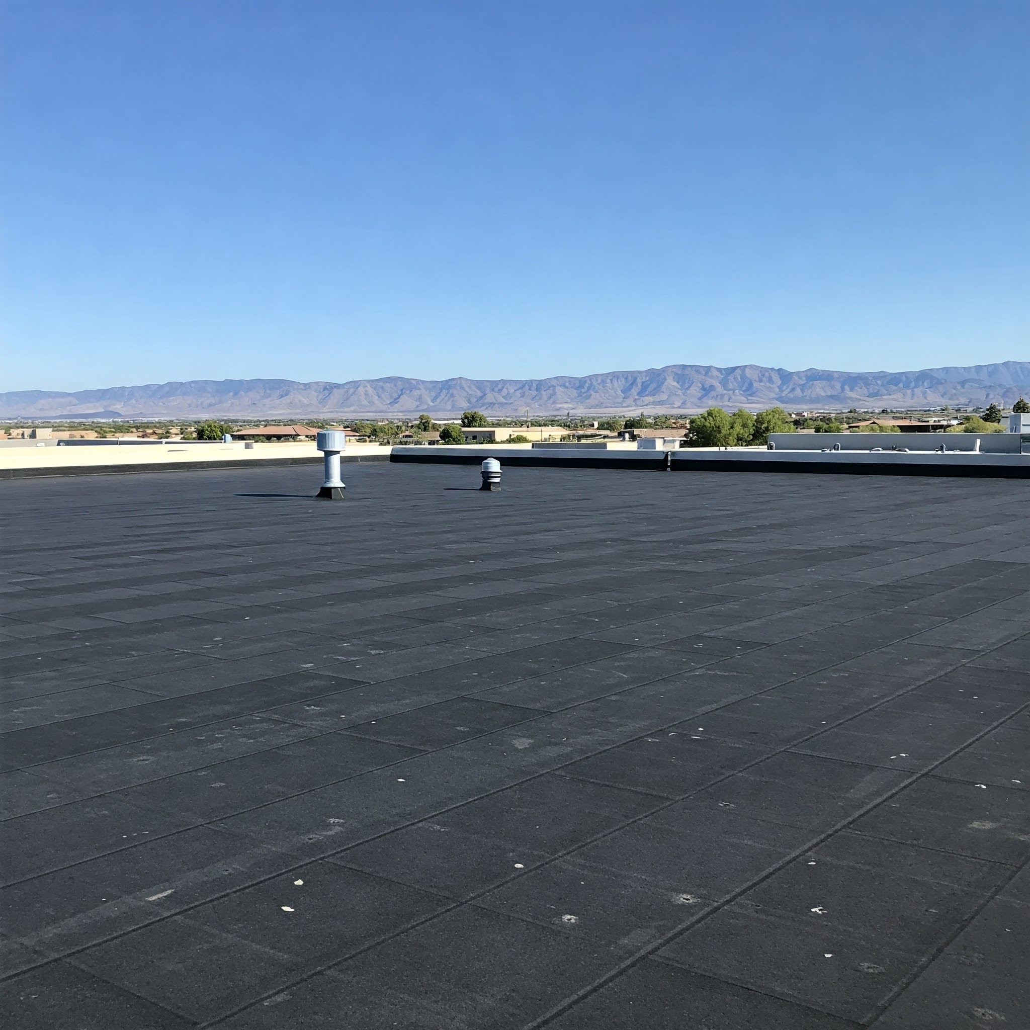 Modified Bitumen Roofing: Enhanced Flexibility and Performance ...